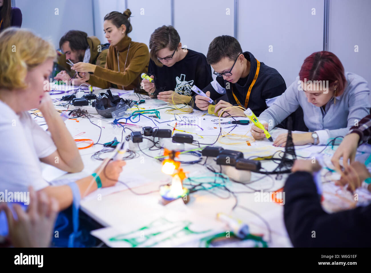 People using 3D printing pens Stock Photo - Alamy