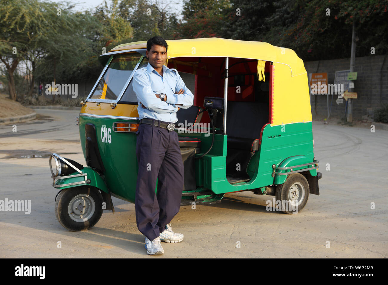 Auto driver standing arms crossed hi-res stock photography and images ...