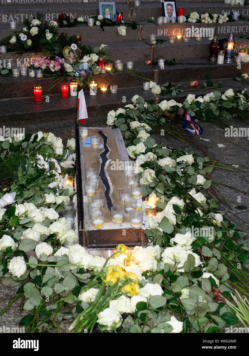 A golden rift in the ground commemorates the victims of the terrorist ...