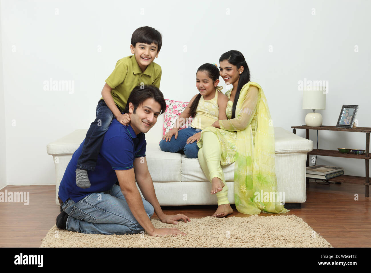 Family playing at home Stock Photo - Alamy