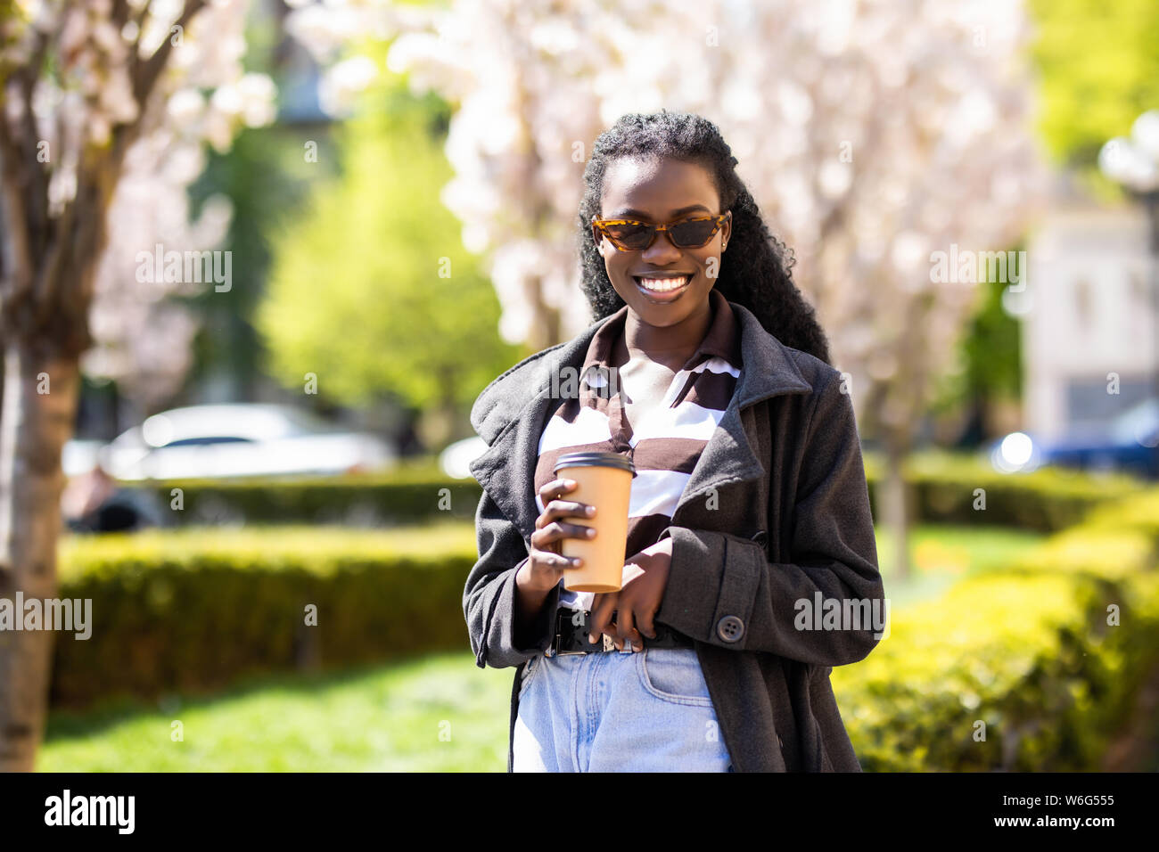 Woman Standing Drinking Coffee