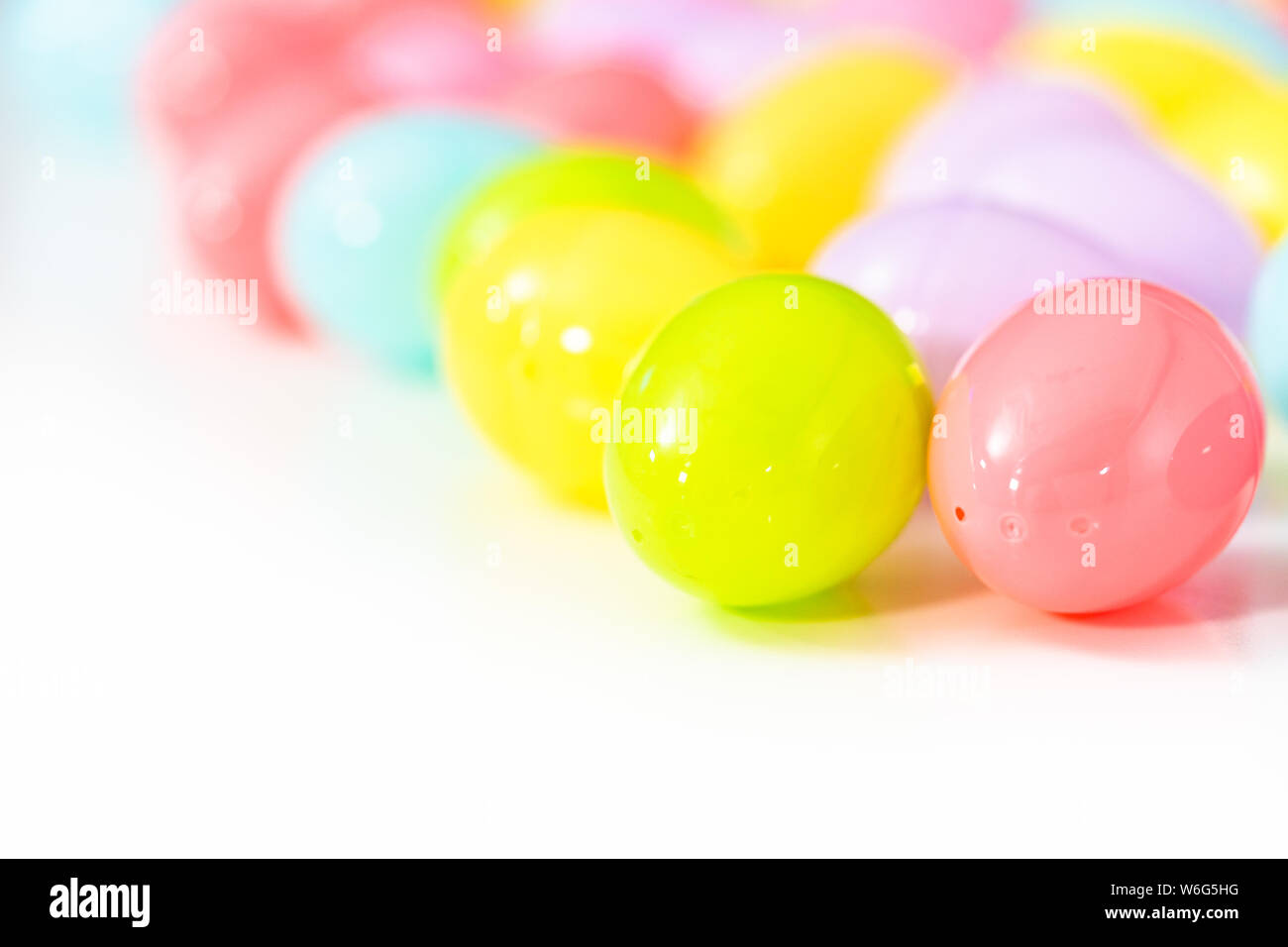 Plastic Easter eggs on a white background Stock Photo - Alamy