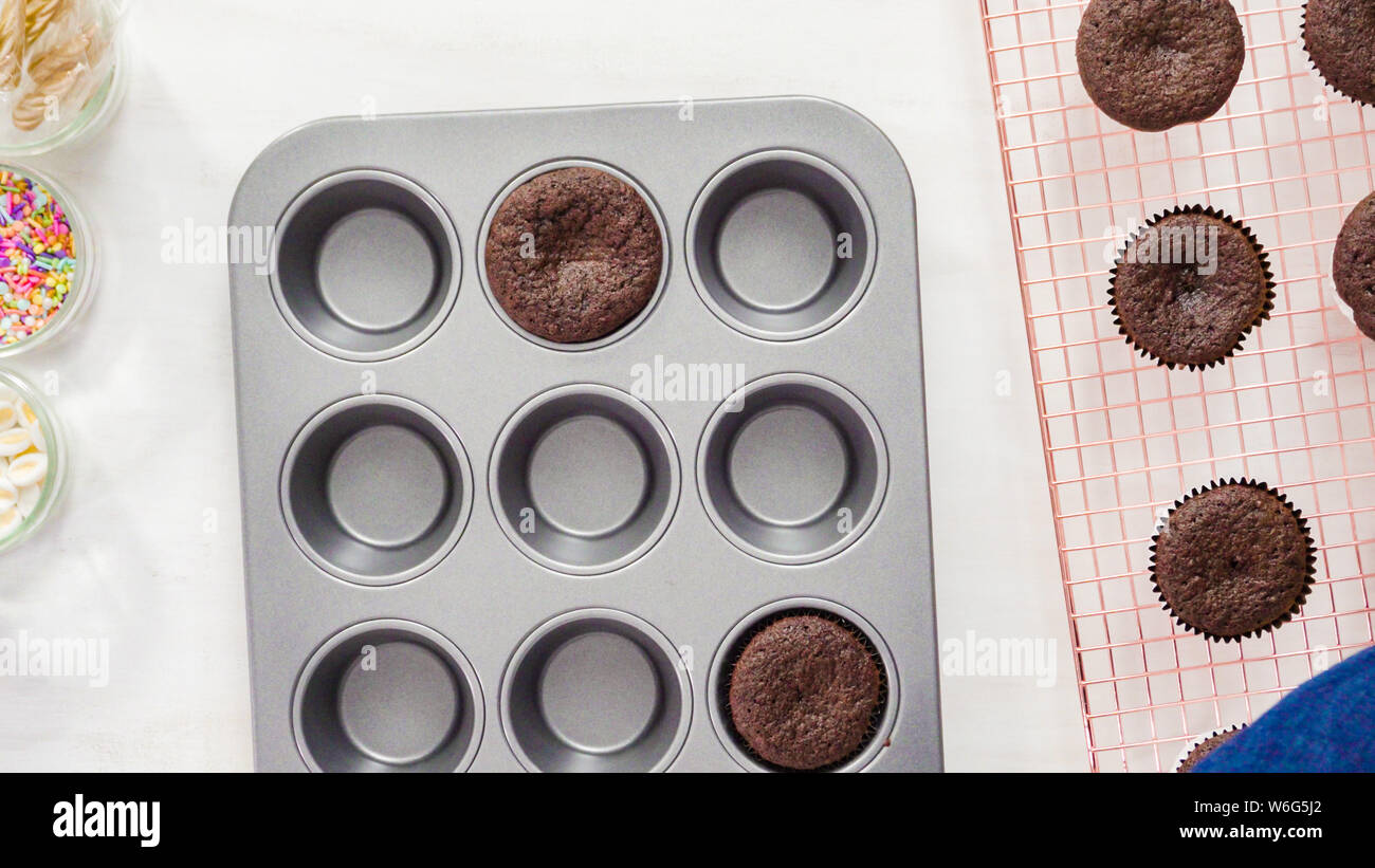 Flat lay. Step by step. Cooling freshly baked chocolate cupcakes on a ...