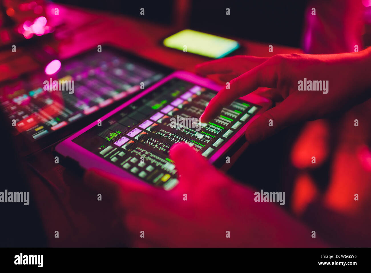 studio working with sound and light mixer console,hands of sound ...