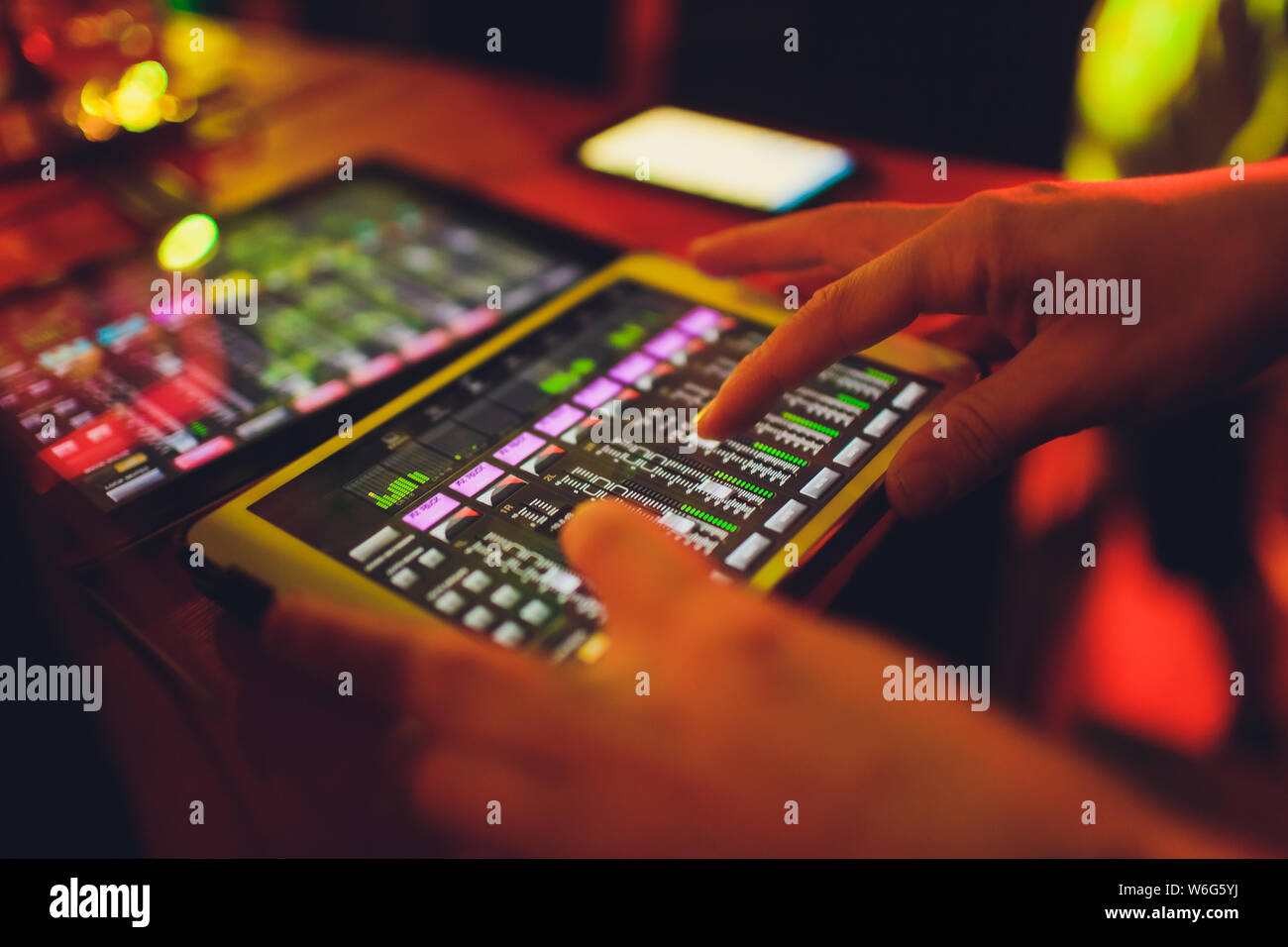 studio working with sound and light mixer console,hands of sound ...