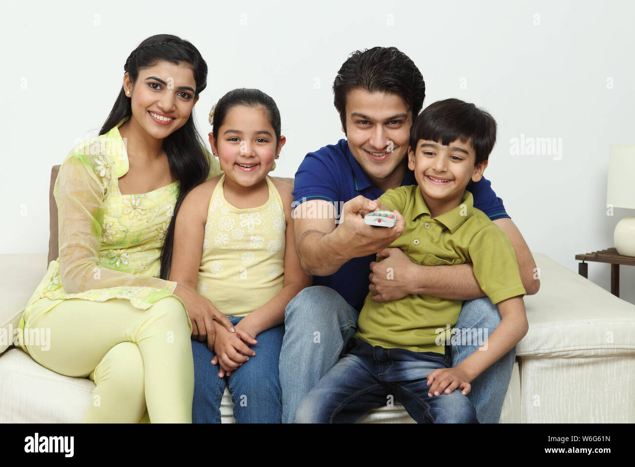 Happy family member holding hi-res stock photography and images - Alamy