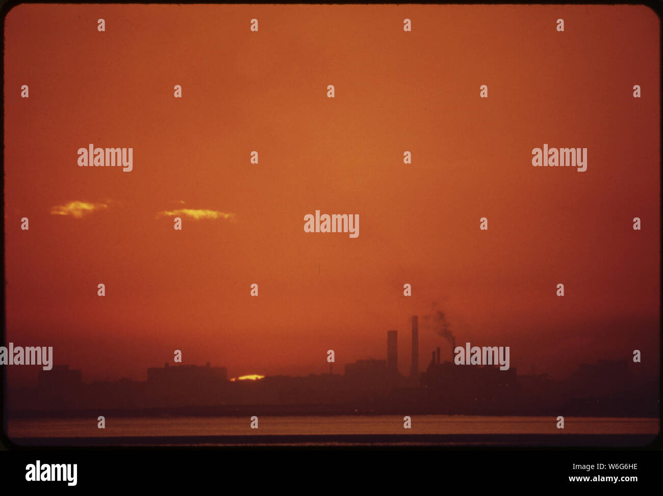 DAWN'S EARLY LIGHT STRUGGLES THROUGH THE SMOG OVER CLEVELAND Stock ...