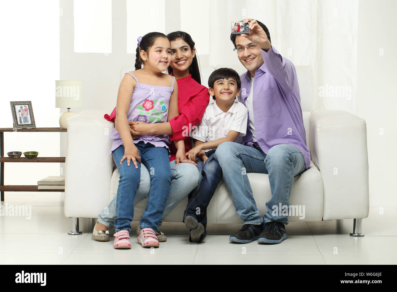 Family taking picture of themselves Stock Photo - Alamy