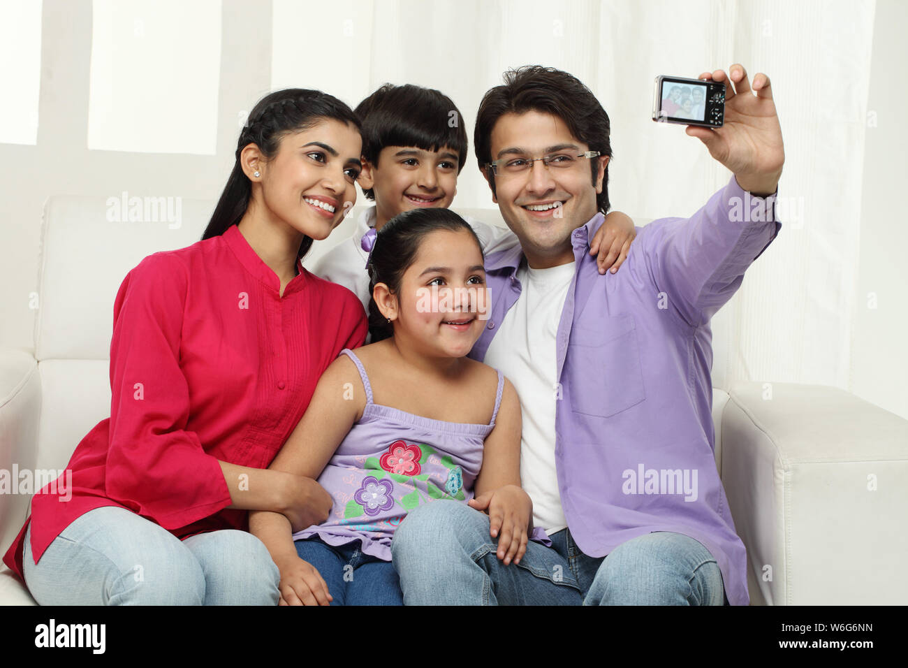 Family taking picture of themselves Stock Photo - Alamy