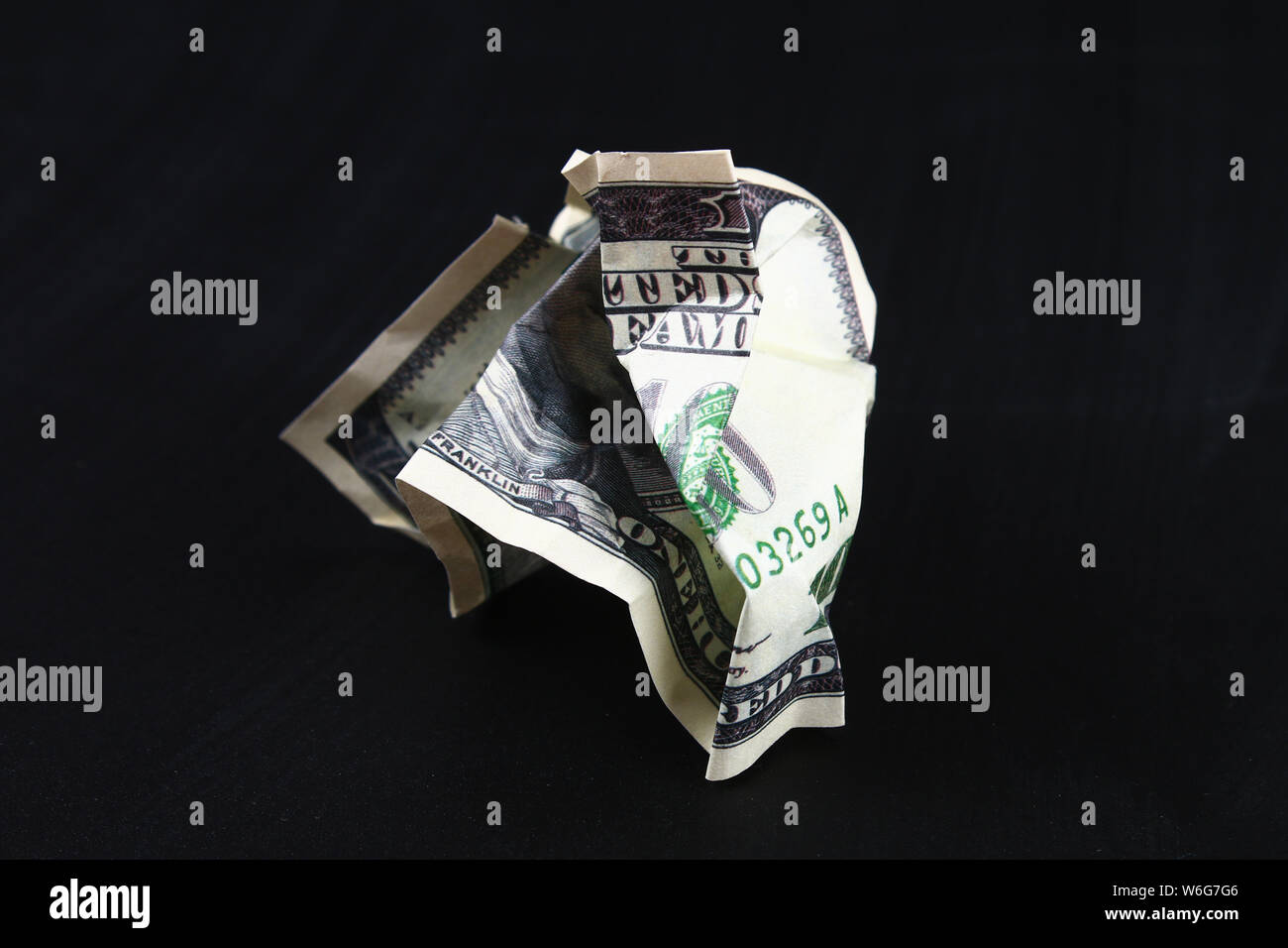 One hundred dollar bills crumpled hi-res stock photography and images ...
