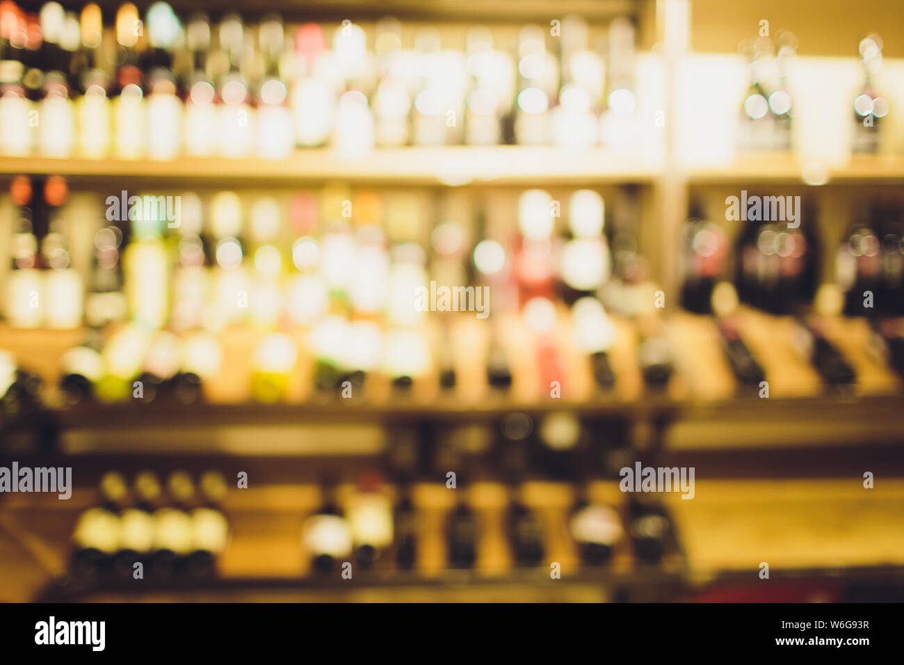 Blurred image of liquor shop for background uses Stock Photo - Alamy