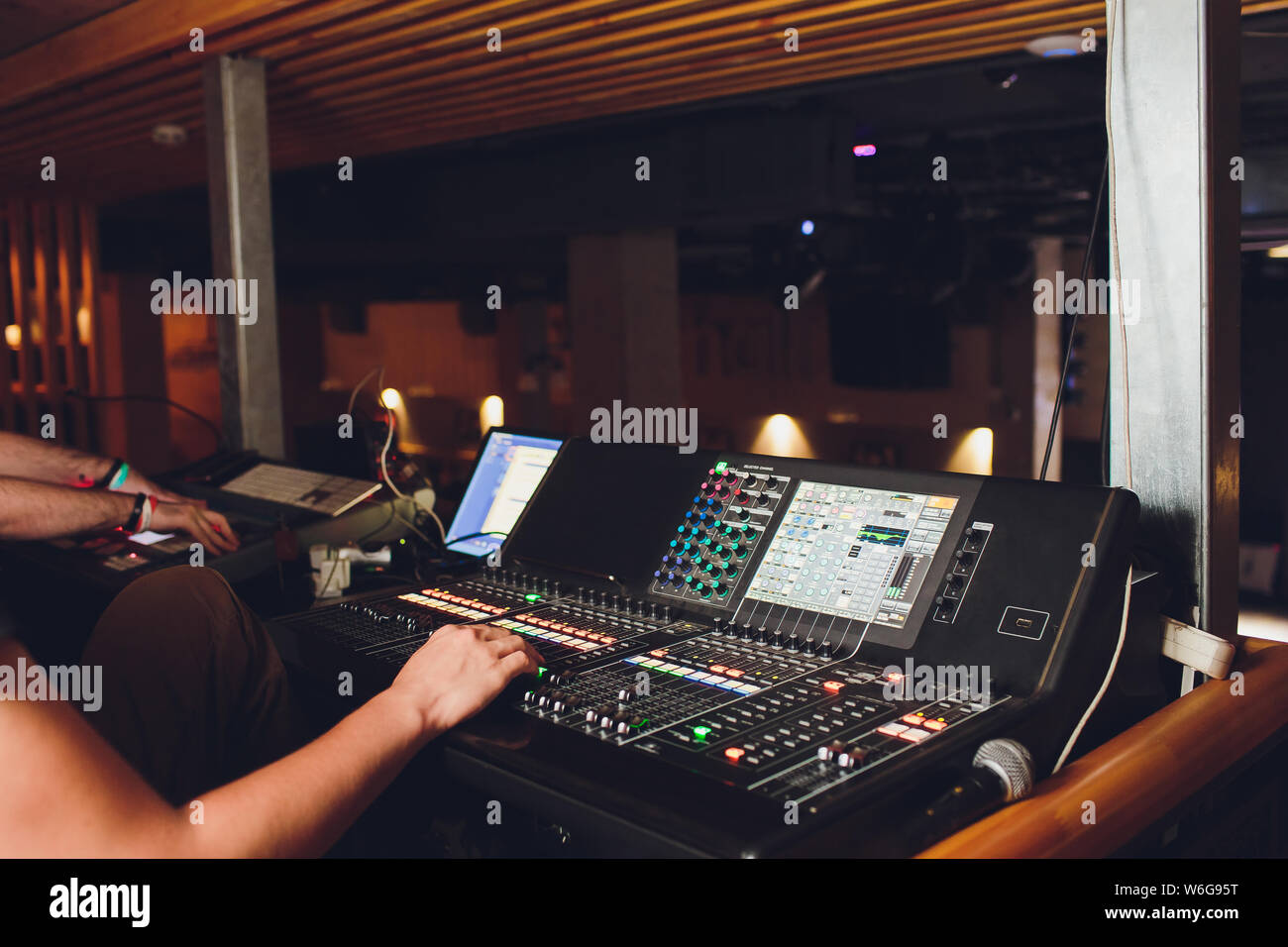 studio working with sound and light mixer console,hands of sound ...