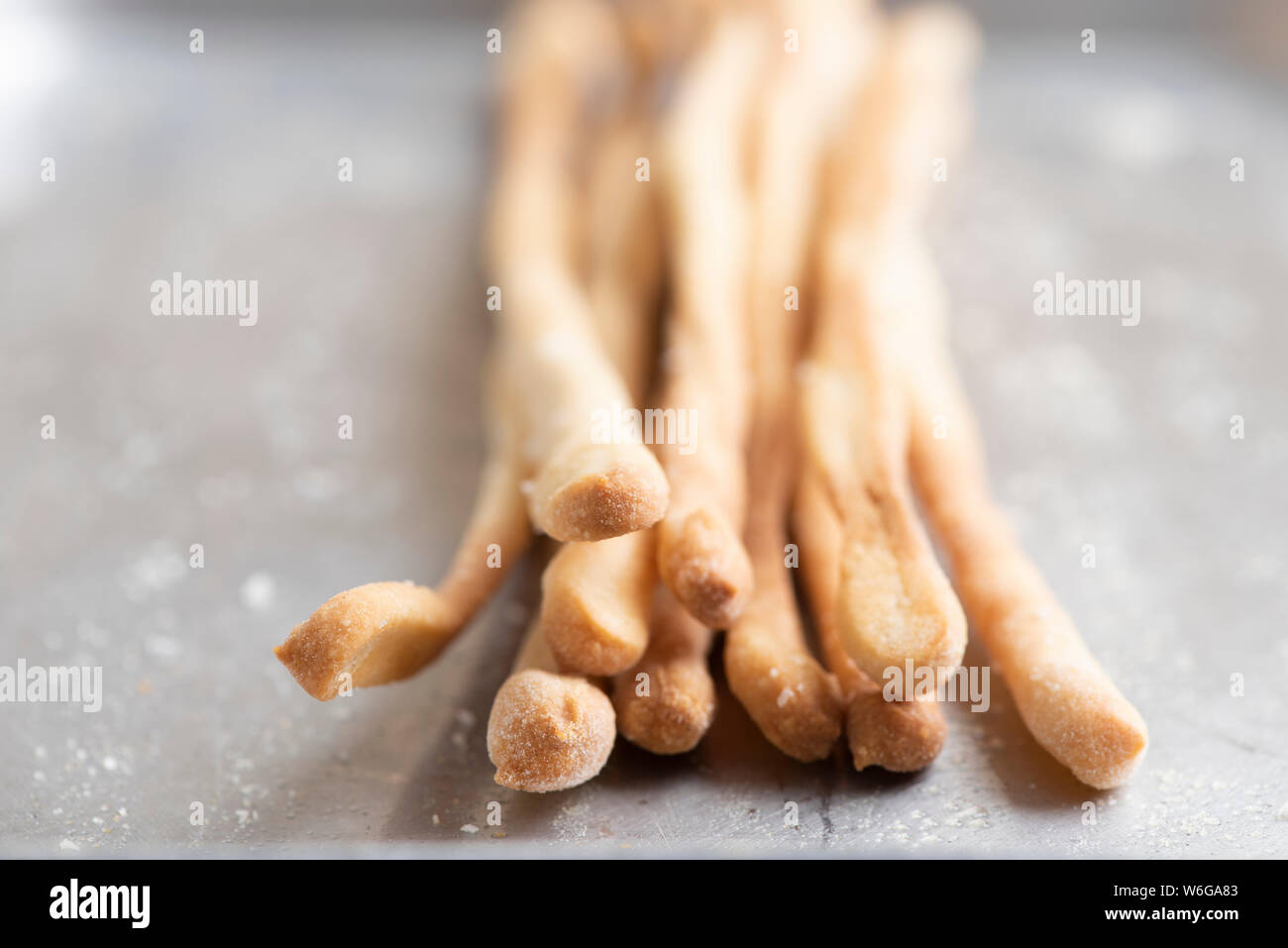 Rustic, home made bread sticks. Close up end on Stock Photo - Alamy