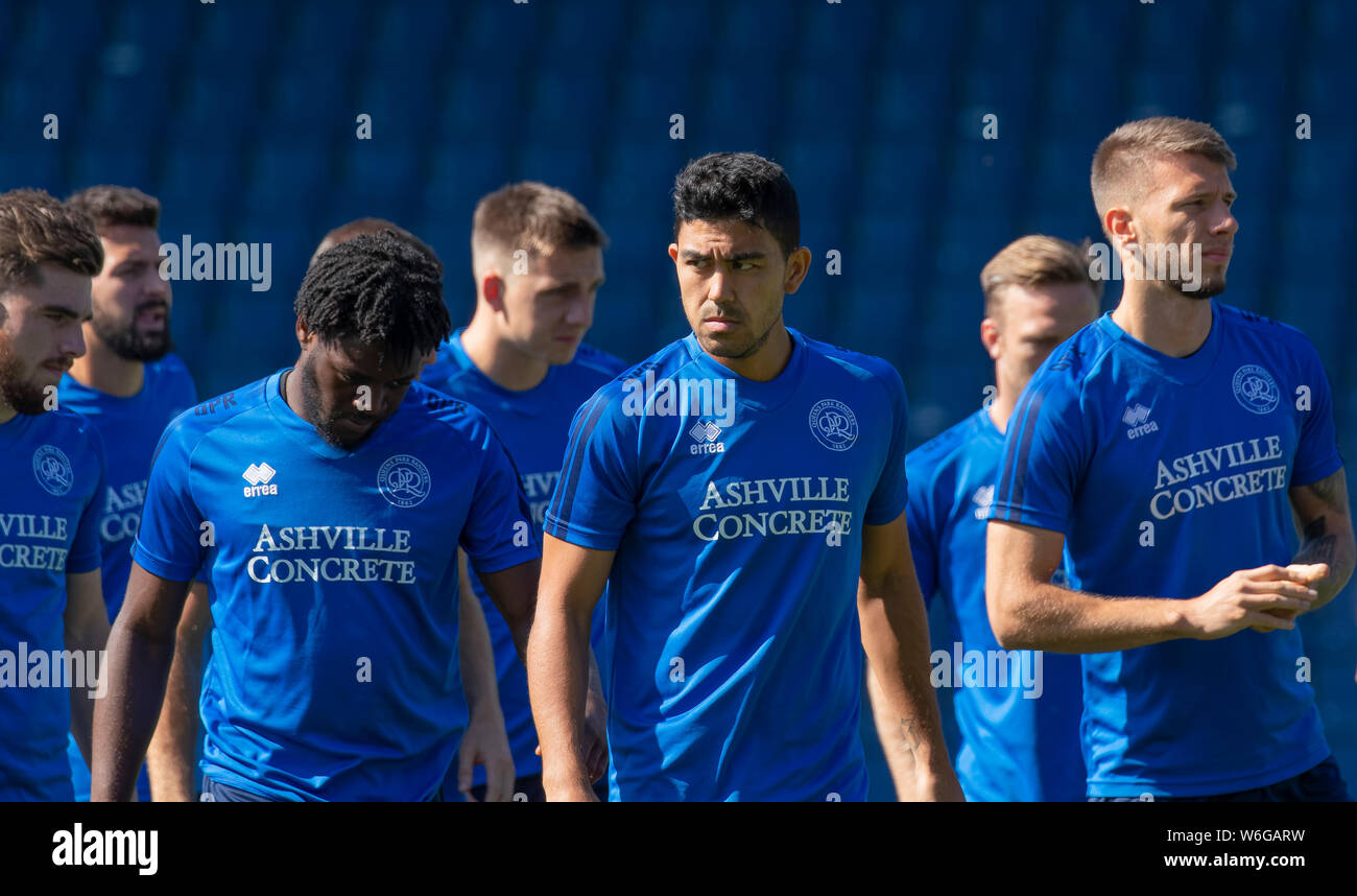 QPR players at a training session at Loftus Road in West London W12 dressed in blue Stock Photo ...
