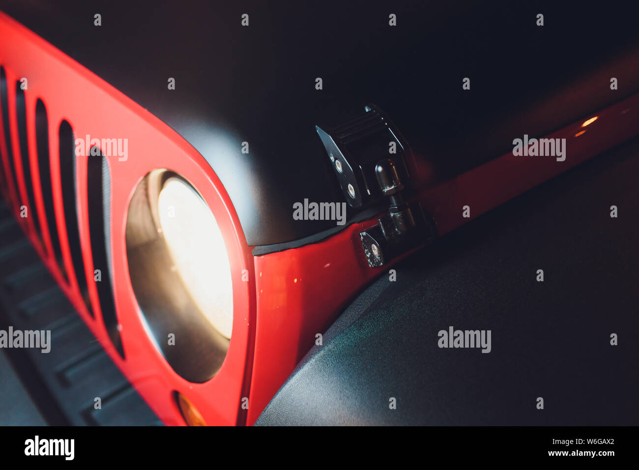 Close up of headlight detail of modern luxury car with projector lens ...