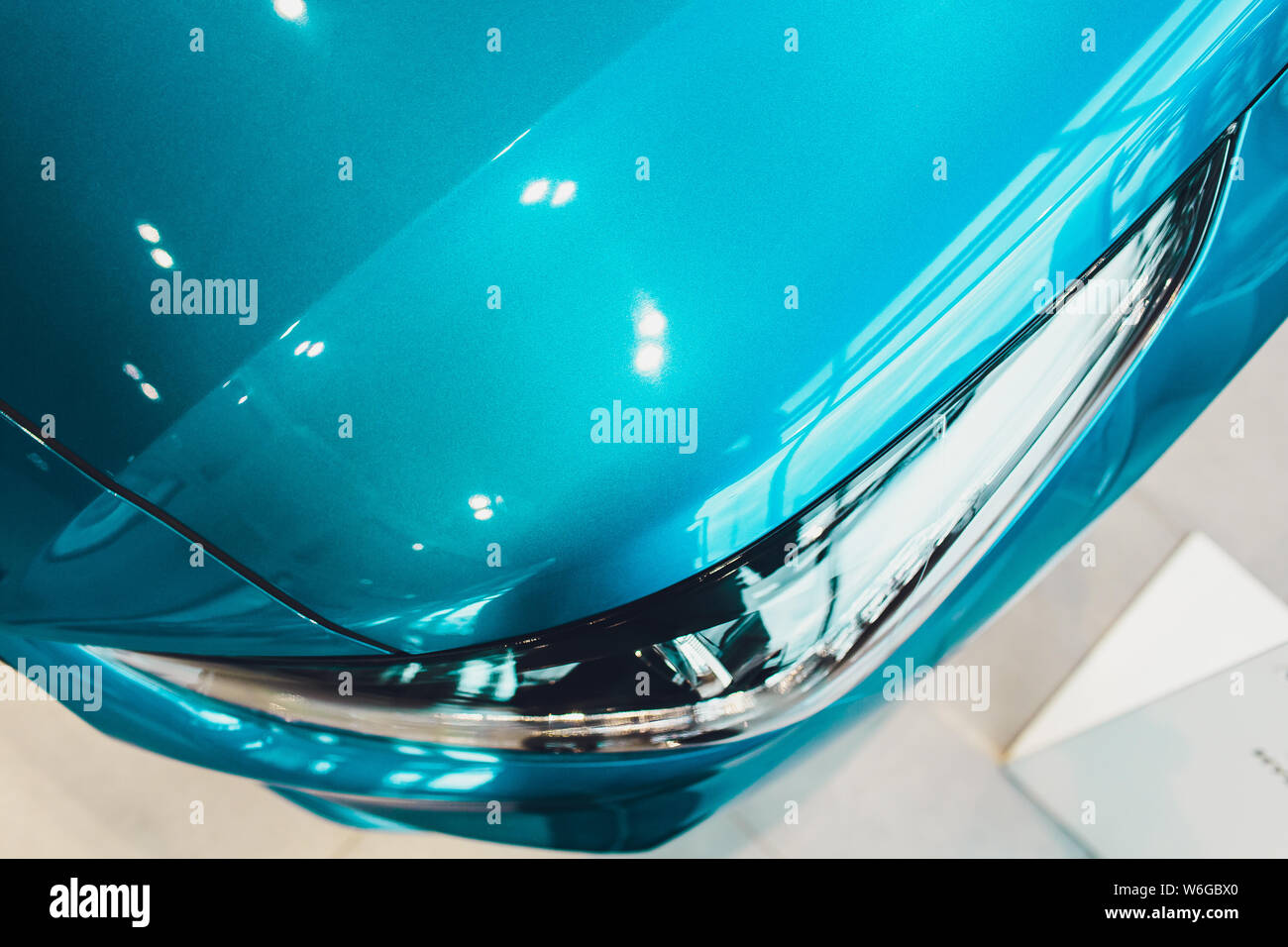 Close up of headlight detail of modern luxury car with projector lens ...