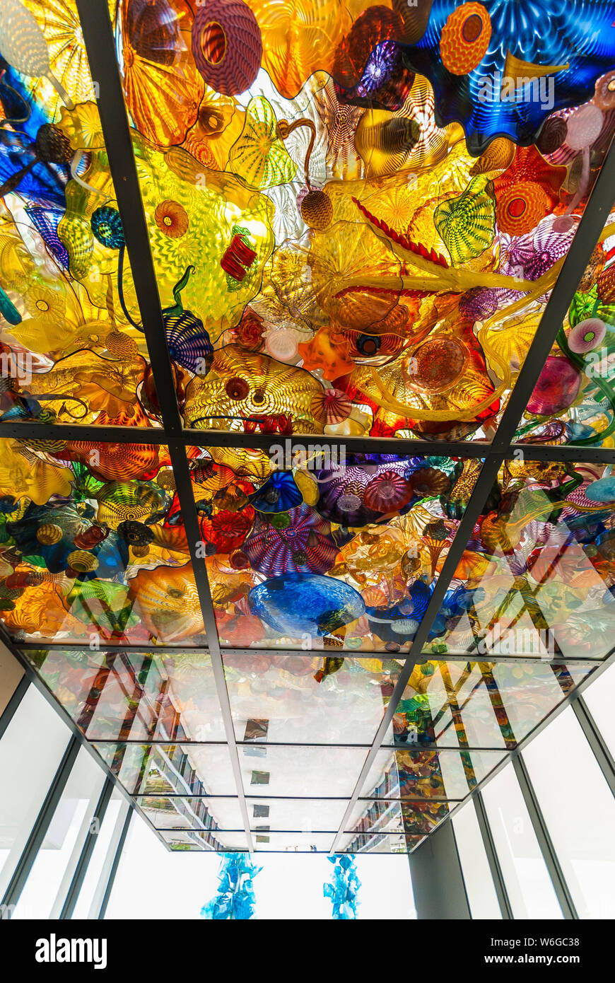 Colorful glass sculptures in glass ceiling on the Bridge of Glass in ...