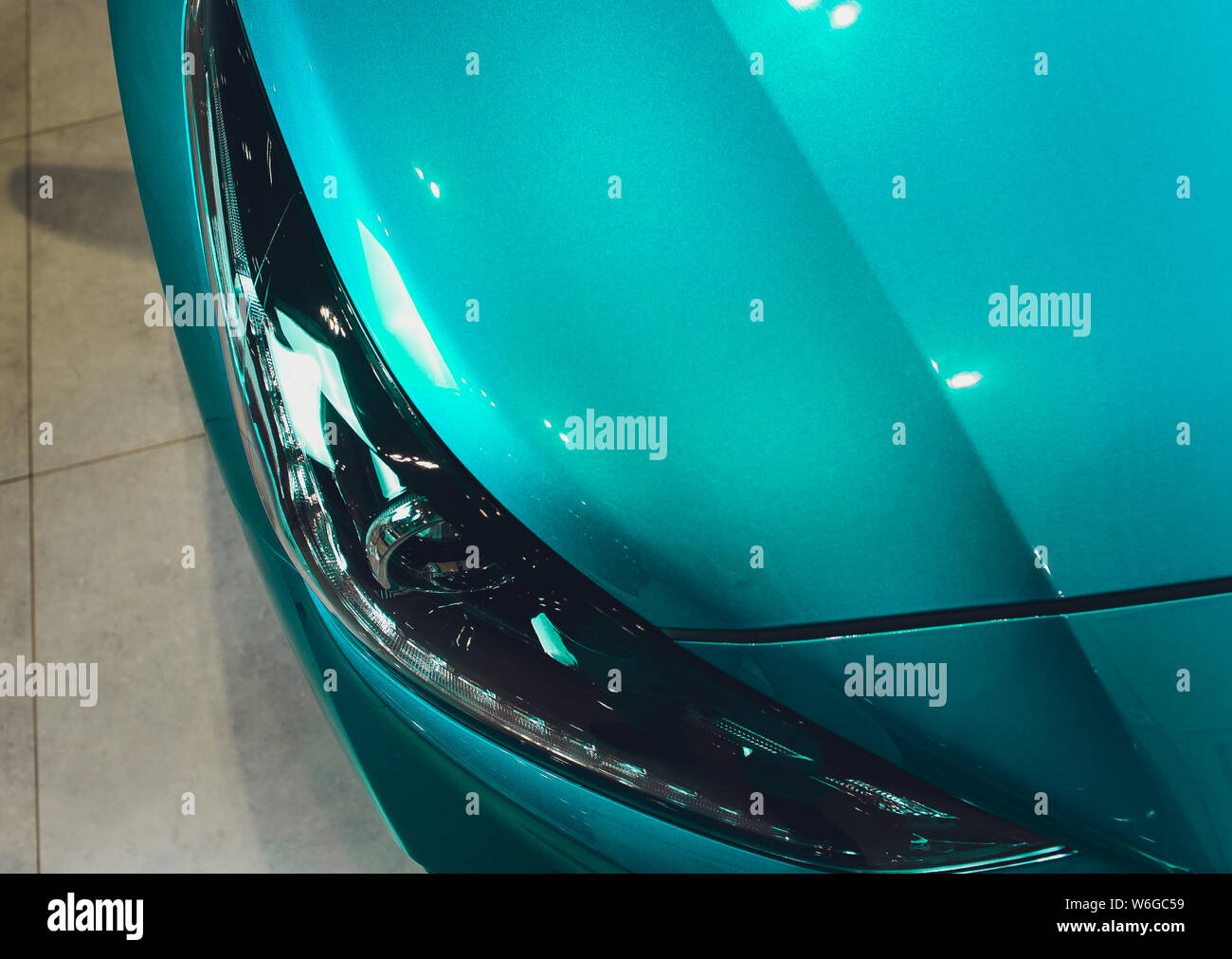Close up of headlight detail of modern luxury car with projector lens ...