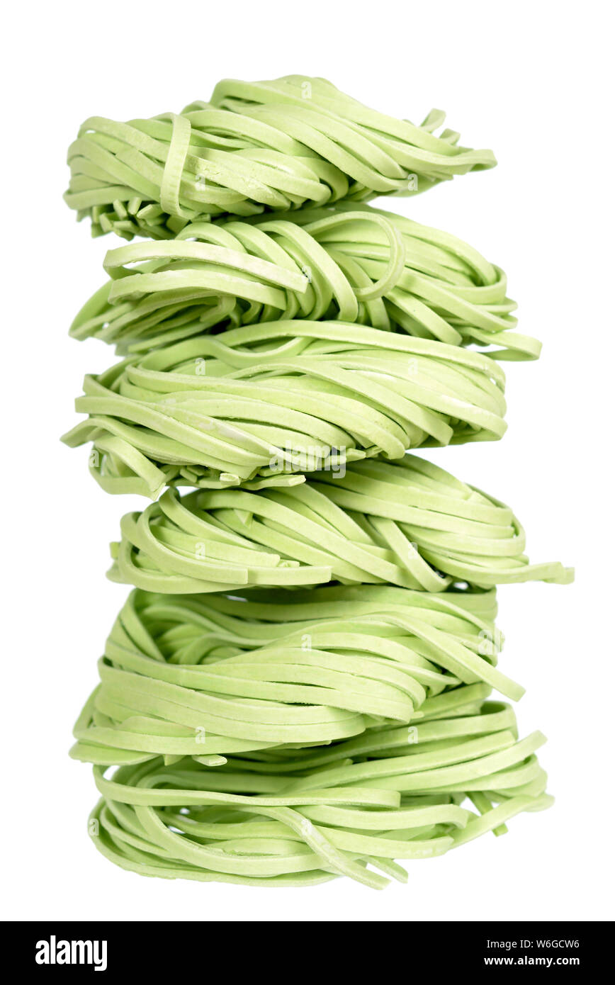 a stack of dried noodle isolated on white background Stock Photo - Alamy