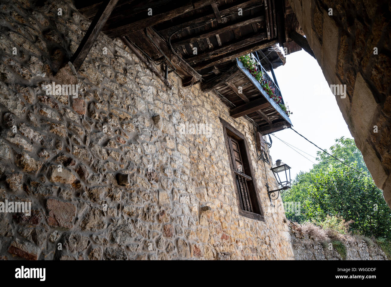 Stone passageway under houses in Santillana del Mar Spain Stock Photo ...