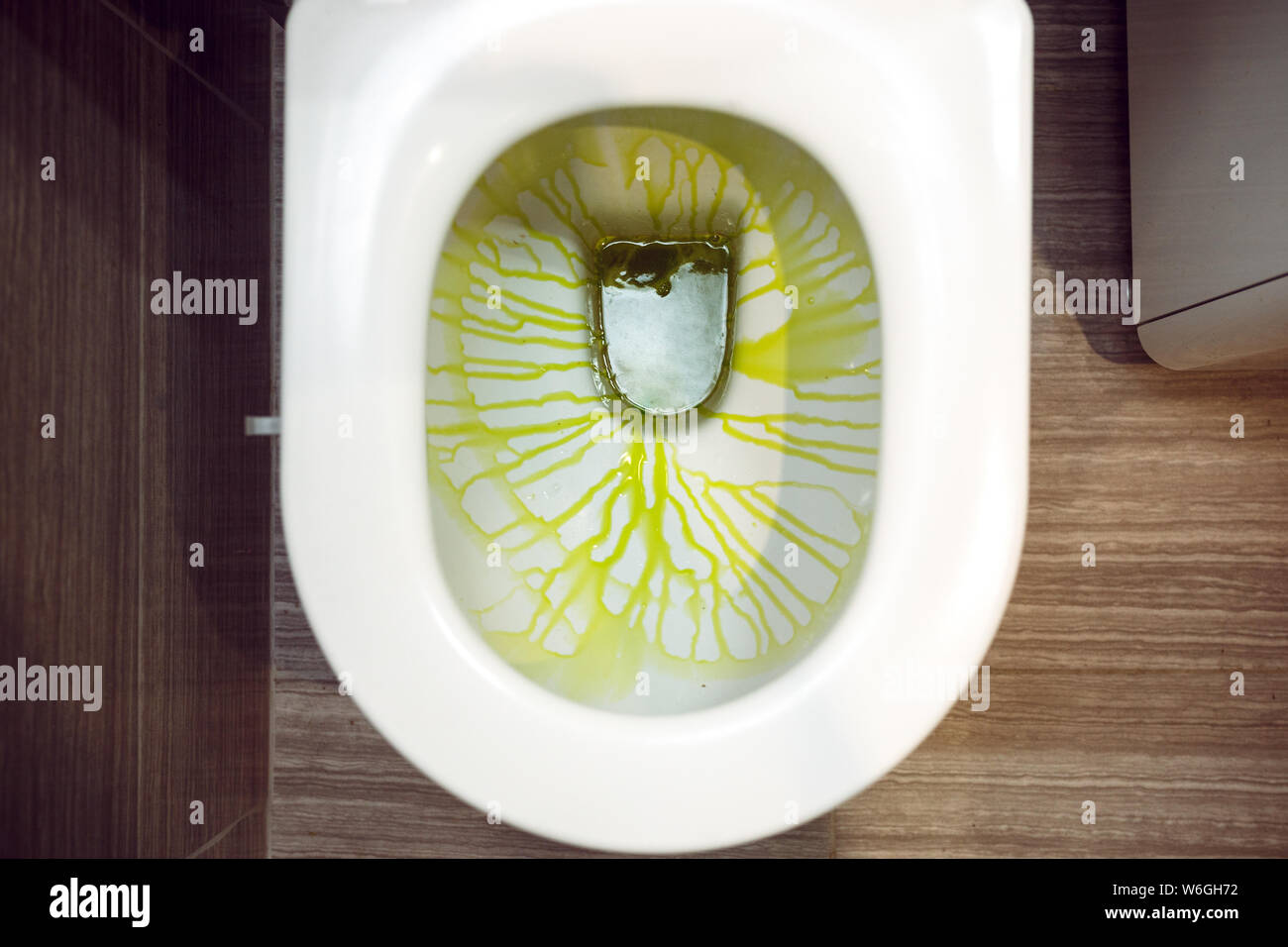 Dirty and unhygienic toilet bowl with limescale stain deposits Stock ...