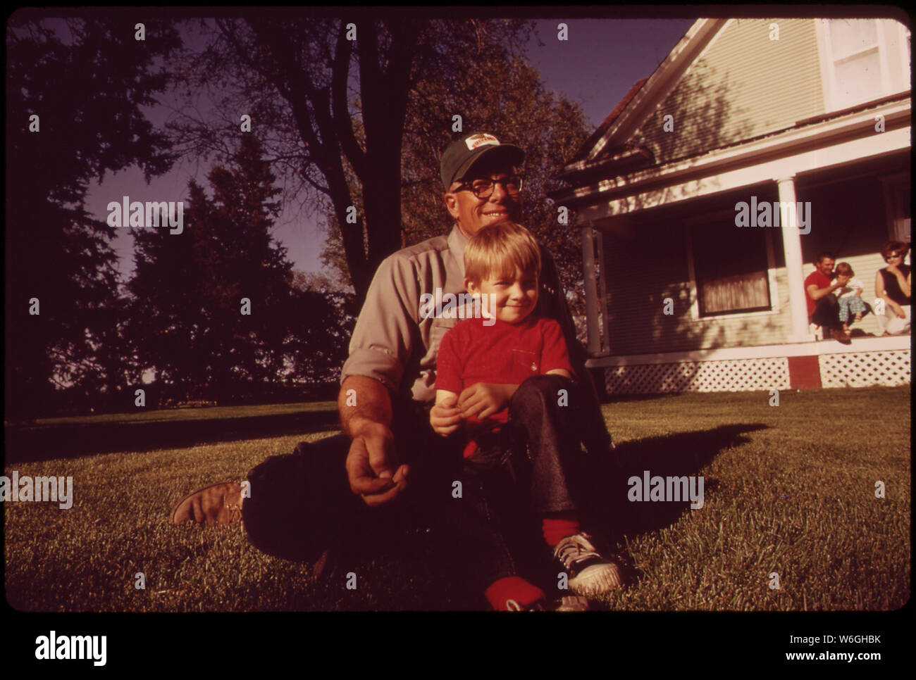 FARMER FRANK OTTE WITH GRANDSON TROY. MR. OTTE WAS BORN ON THIS FARM ...