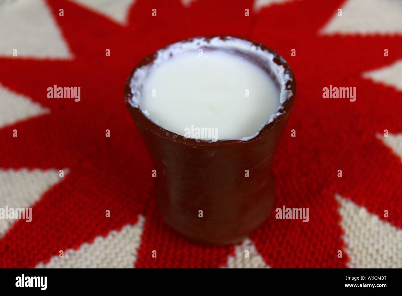Sweet lassi in an earthen glass Stock Photo - Alamy