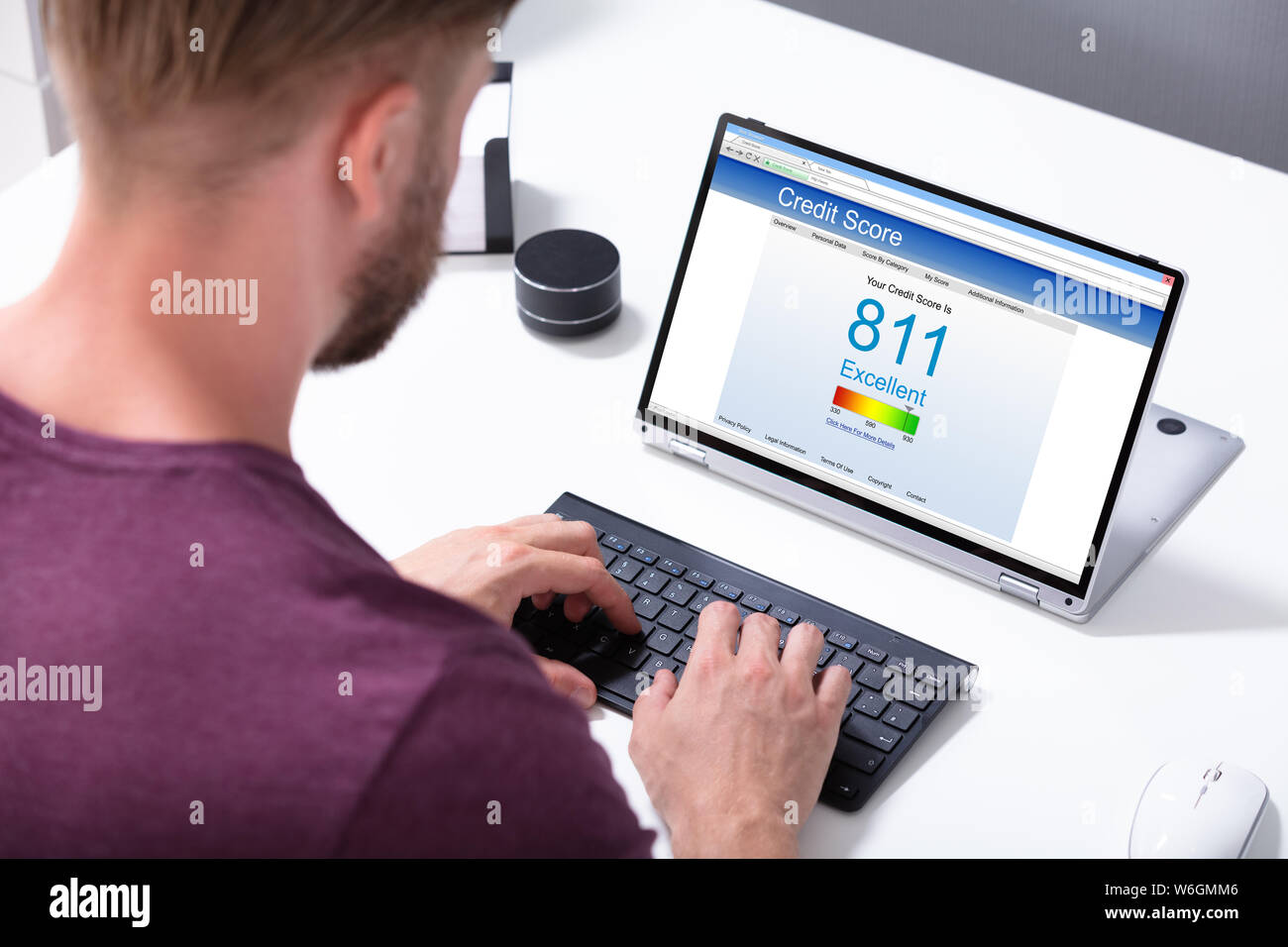 Young Businessman Checking Online Credit Score On Computer In Office ...