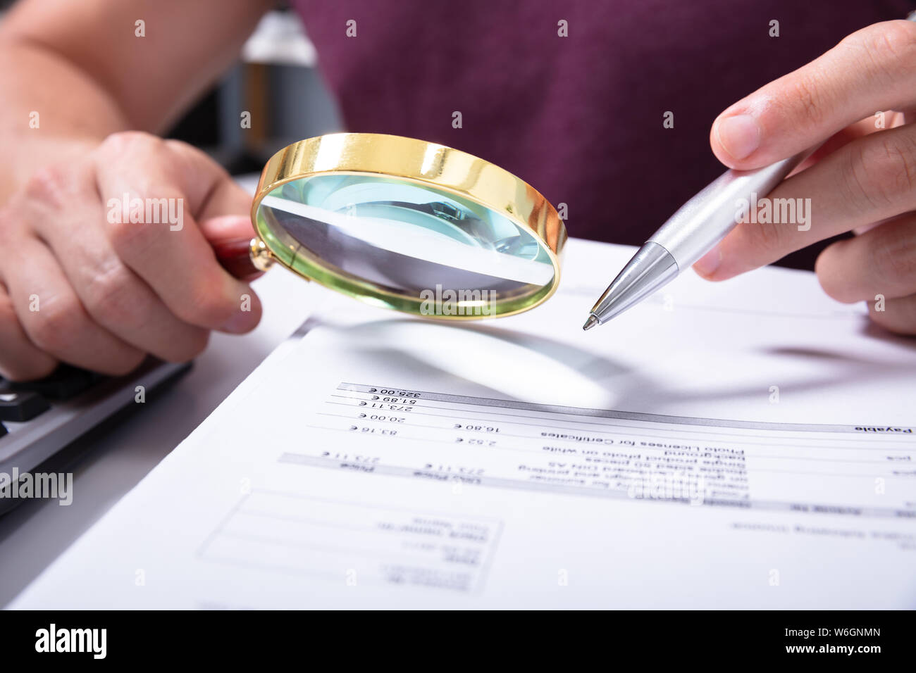 Hand holding magnifying glass checking hi-res stock photography and ...