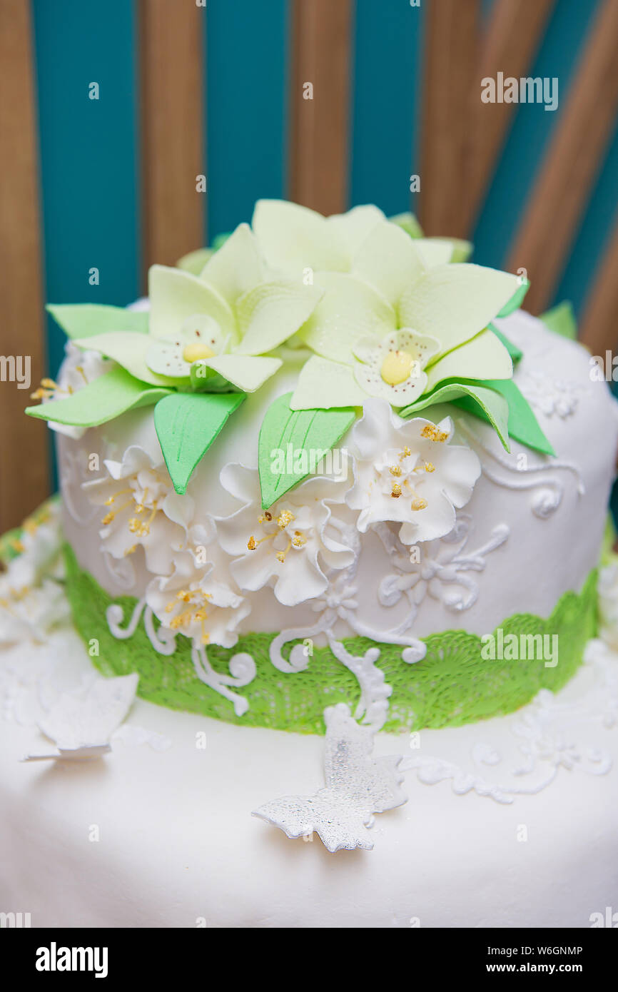 Wedding loaf. A tall beautiful loaf decorated with flowers, designed ...