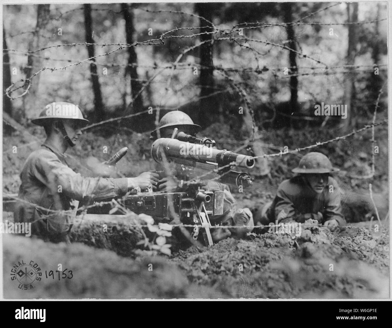 French 37 in firing position on parapet in second-line trench. This gun ...