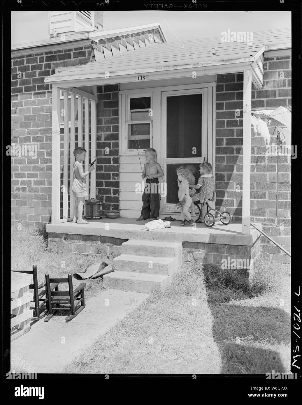 Front porch of home of government housing project now partially ...
