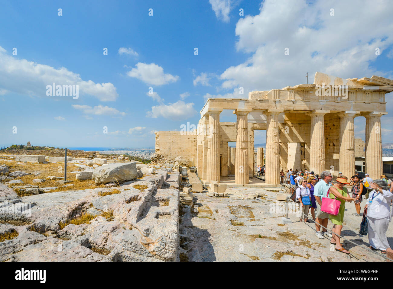 Crowds of tourists gather on their way to the Parthenon on Acropolis ...