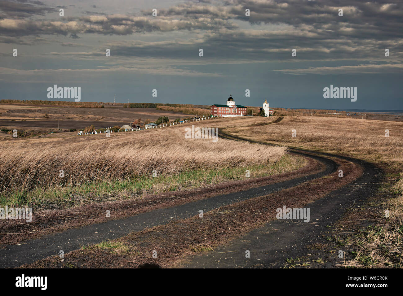 Typical Russian rural landscape with a field and a monastery Stock ...