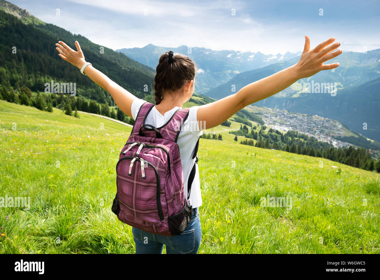 Girl backpack enjoying view mountain hi-res stock photography and ...