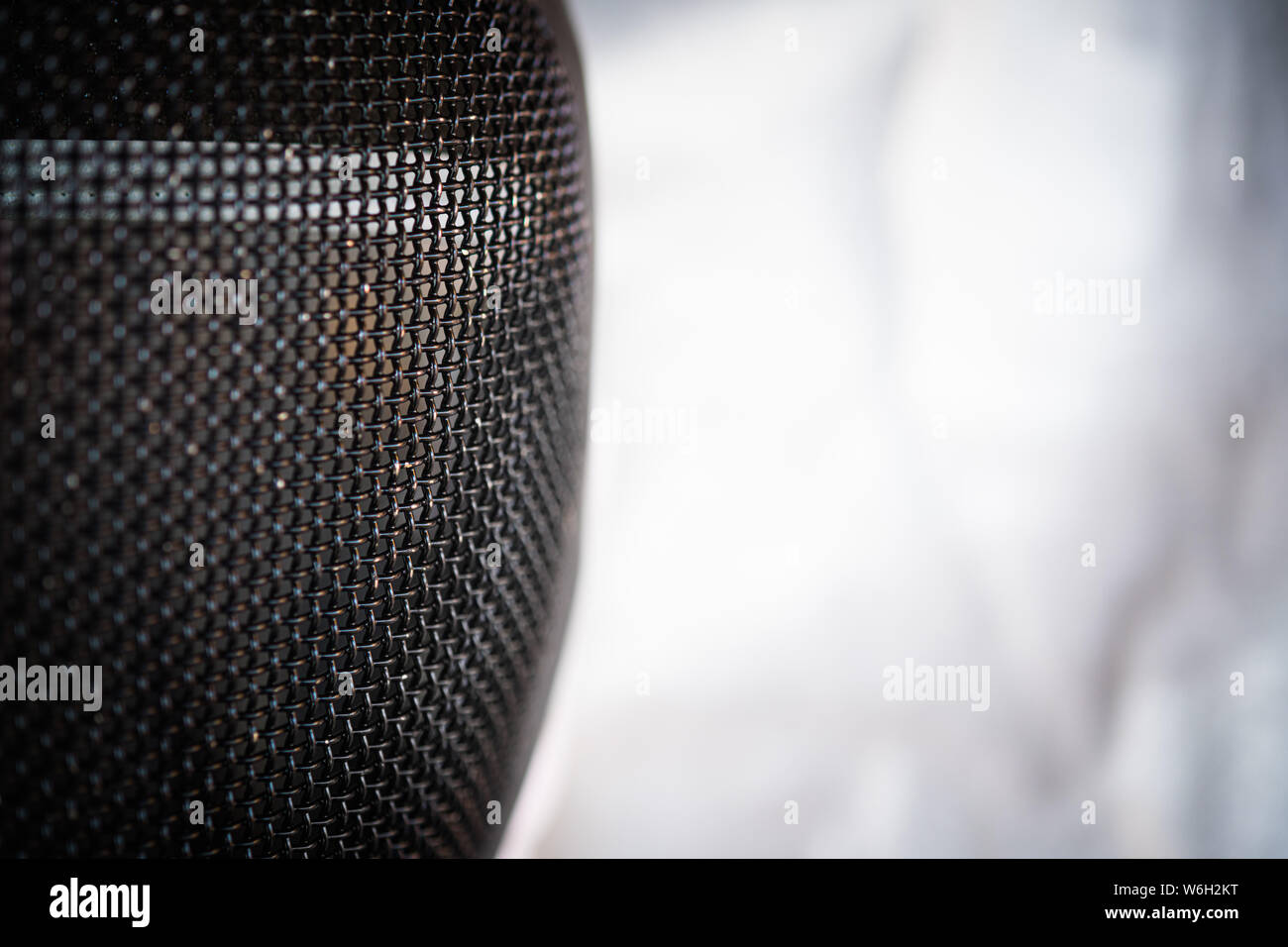 Extreme close up of fencing mask, sport equipment protection safety ...