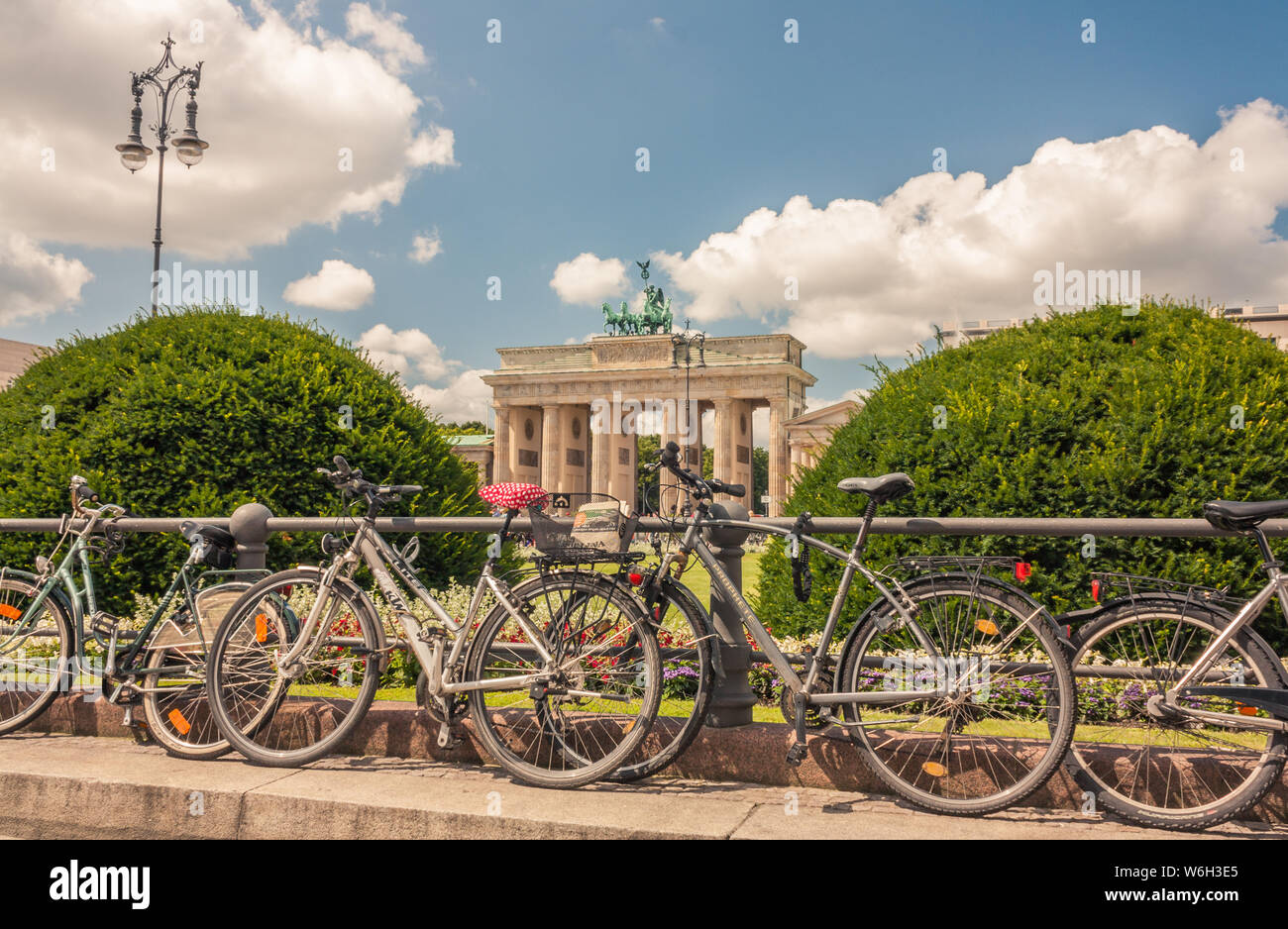 Bicycle in front of a garden gate hi-res stock photography and images ...