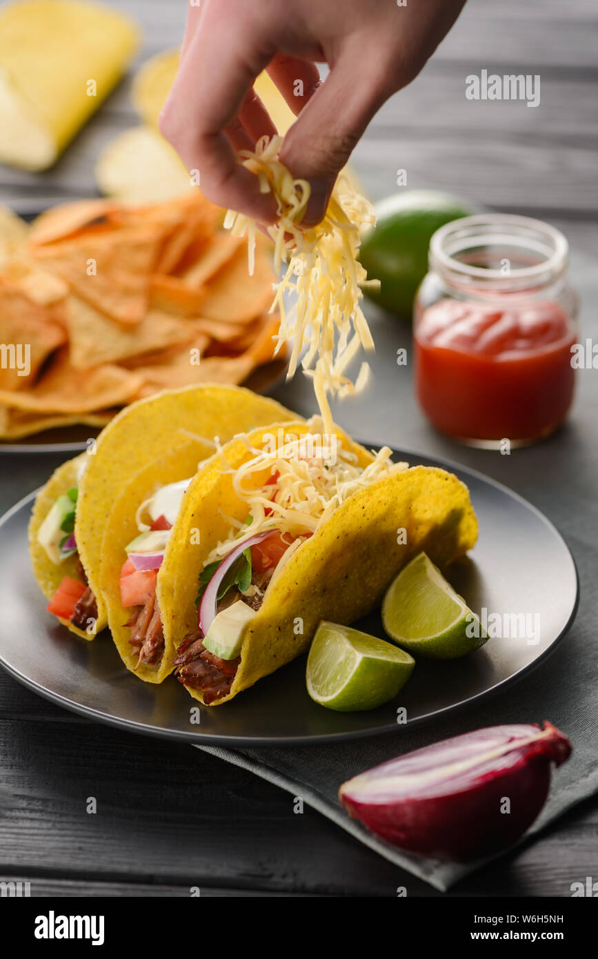 Cooking hard-shell tacos Stock Photo - Alamy