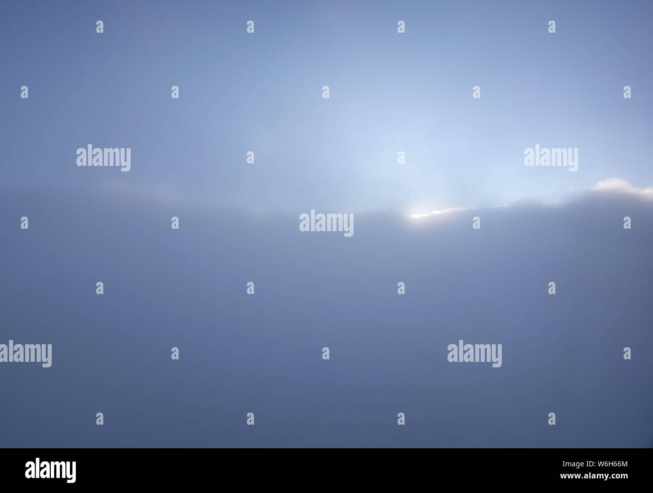 Dreamy aerial cloud landscape flying high above the Earth with ...