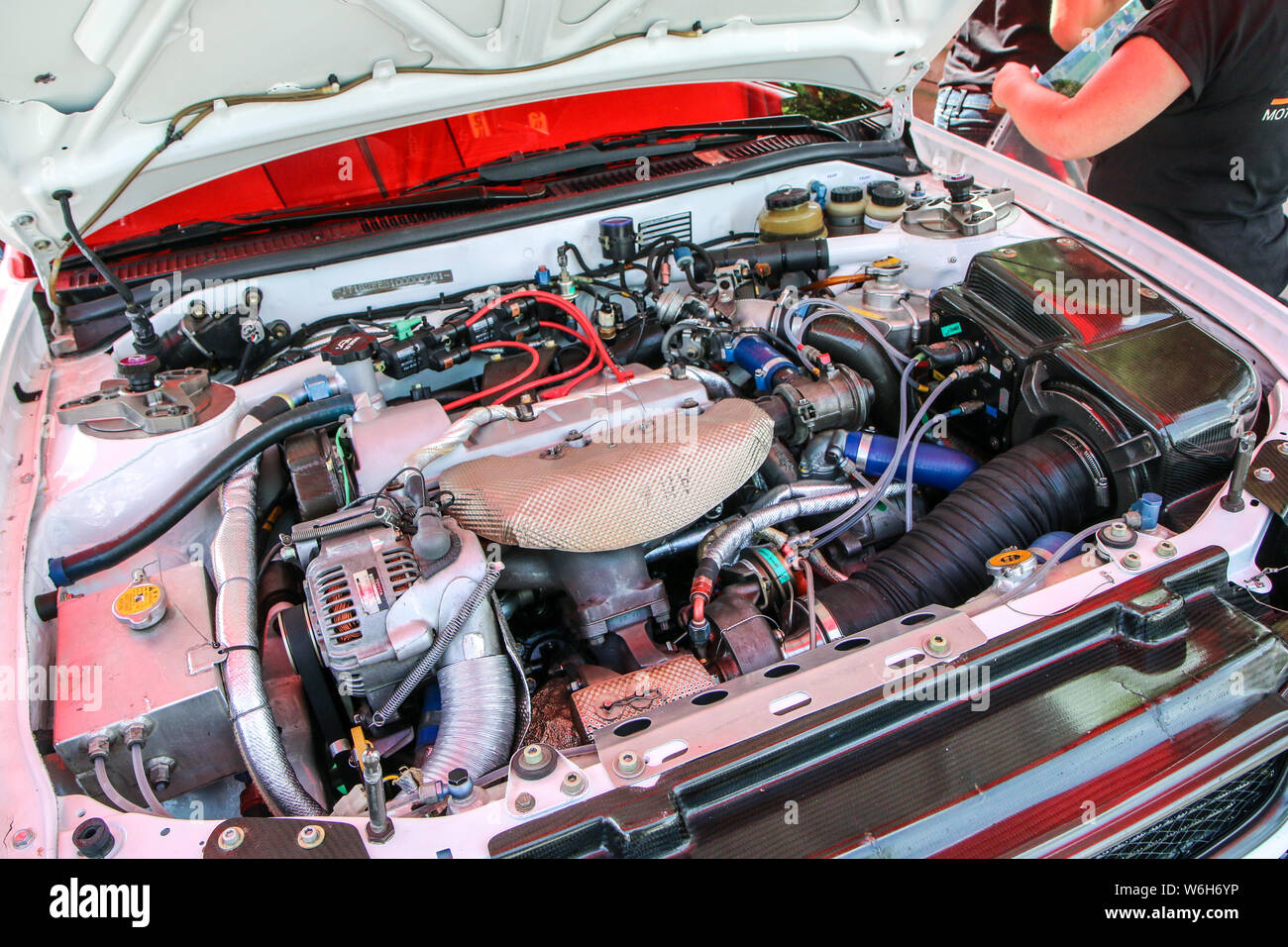 A detail of the sports car engine. It is a historic rallye car from the ...