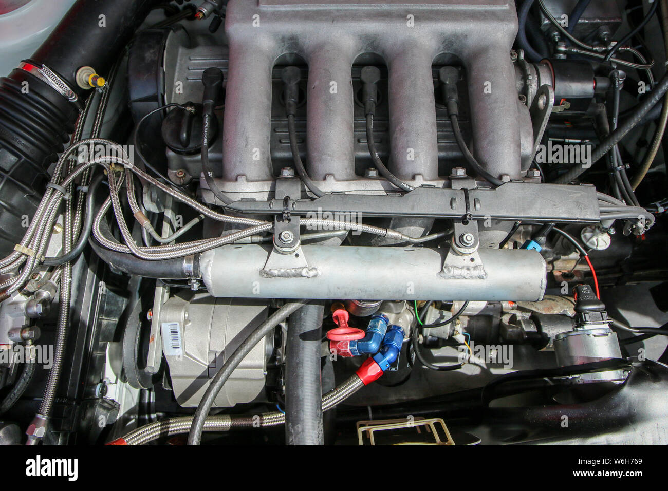 A detail of the sports car engine. It is a historic rallye car from the ...