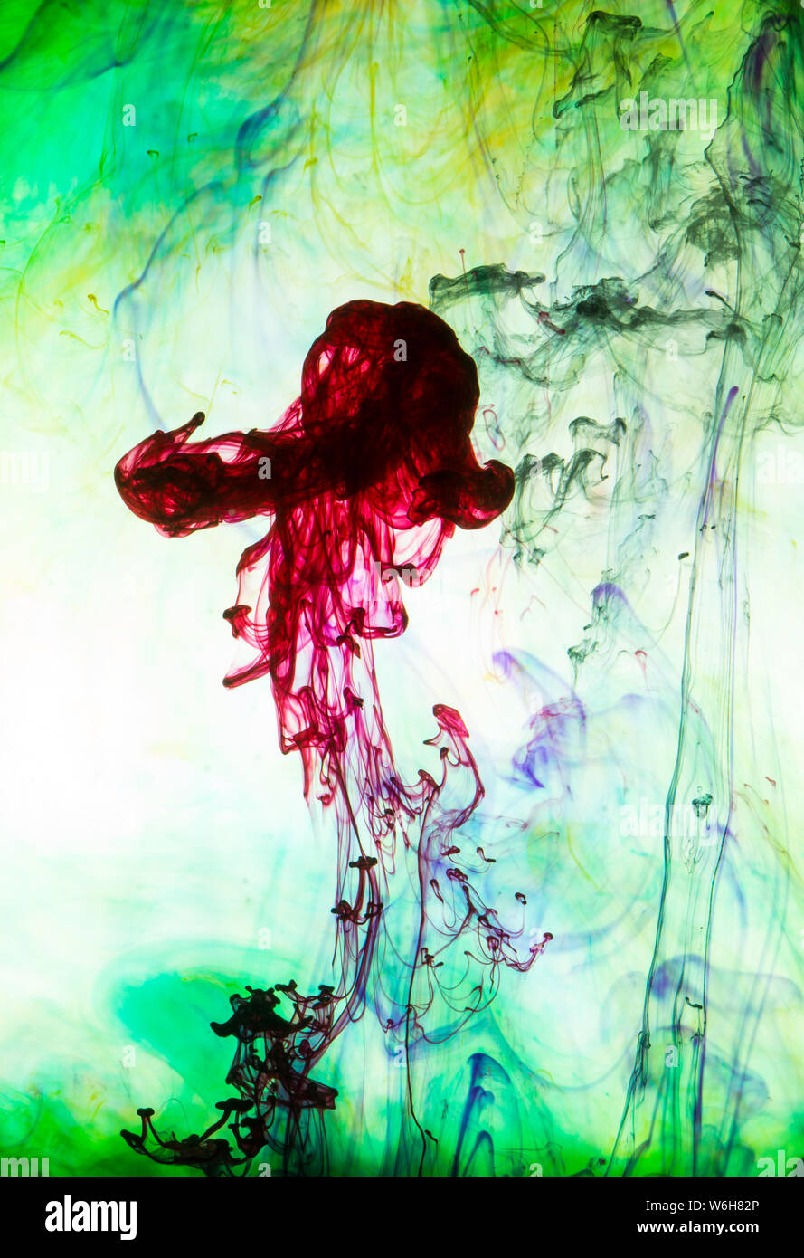 Acrylic colors and ink in water. Abstract background Stock Photo - Alamy