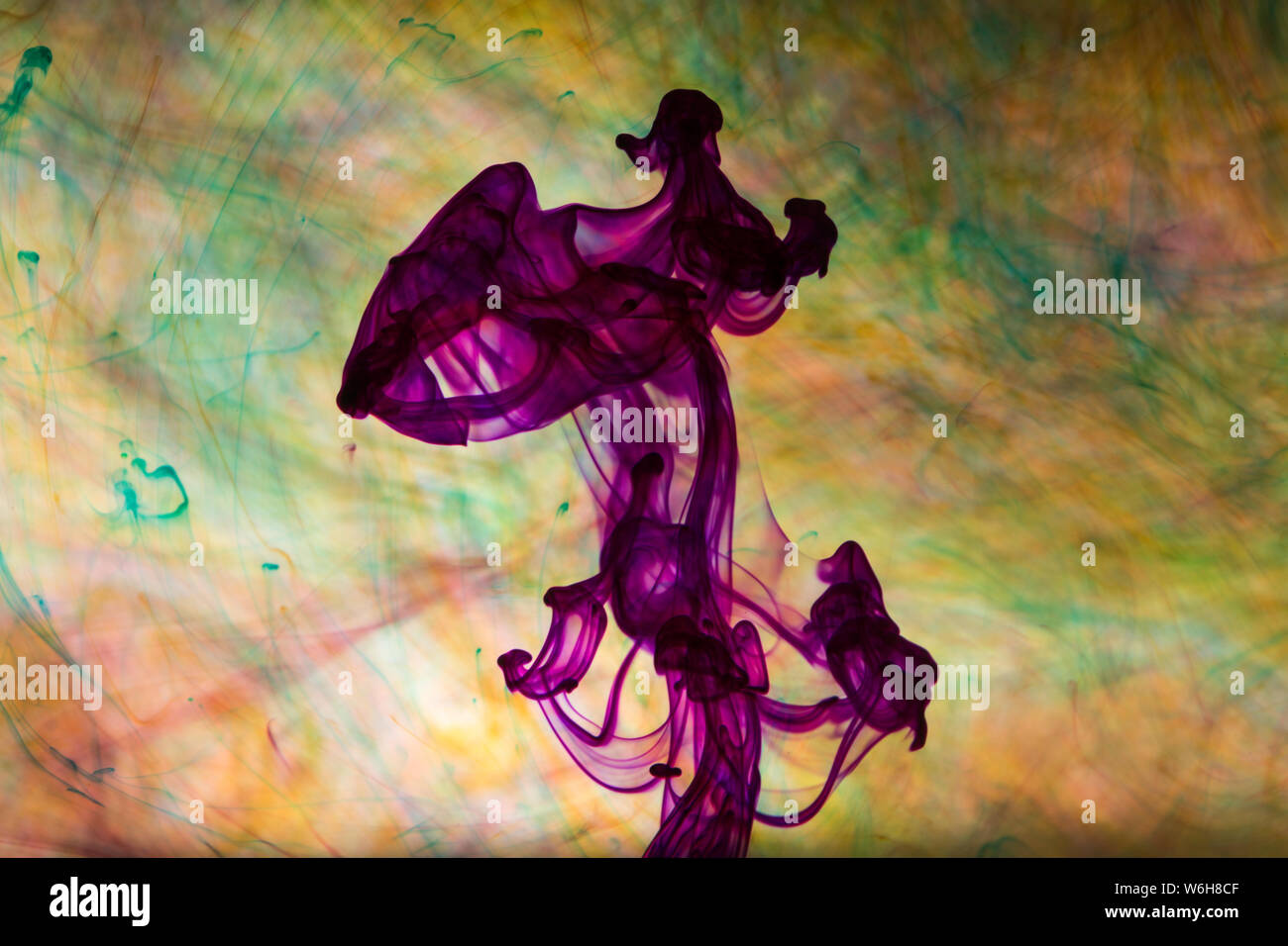 Acrylic colors and ink in water. Abstract background Stock Photo - Alamy