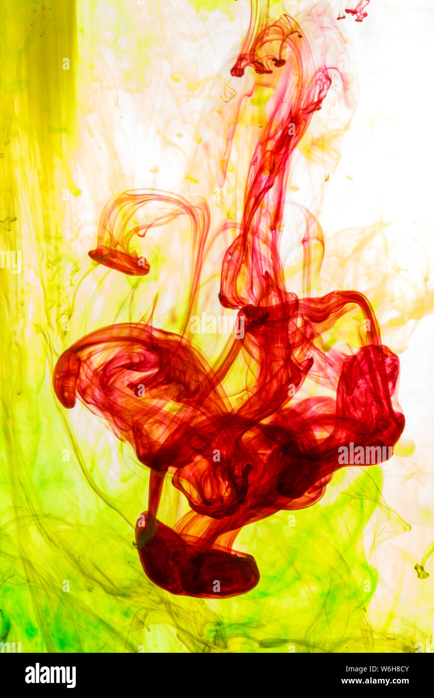 Acrylic colors and ink in water. Abstract background Stock Photo - Alamy