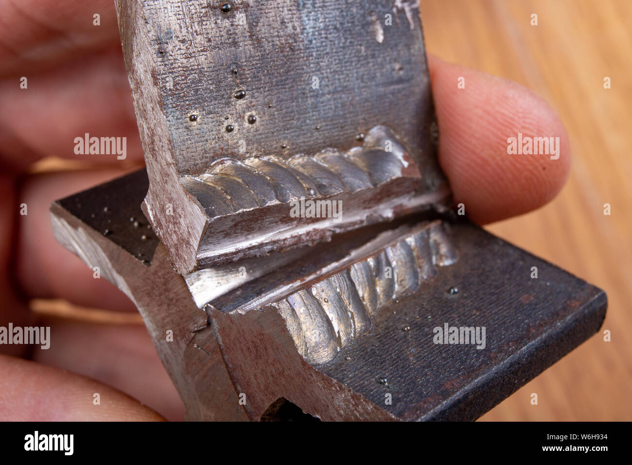 The fillet weld is rubbed with a angle grinder. Destructive method for ...