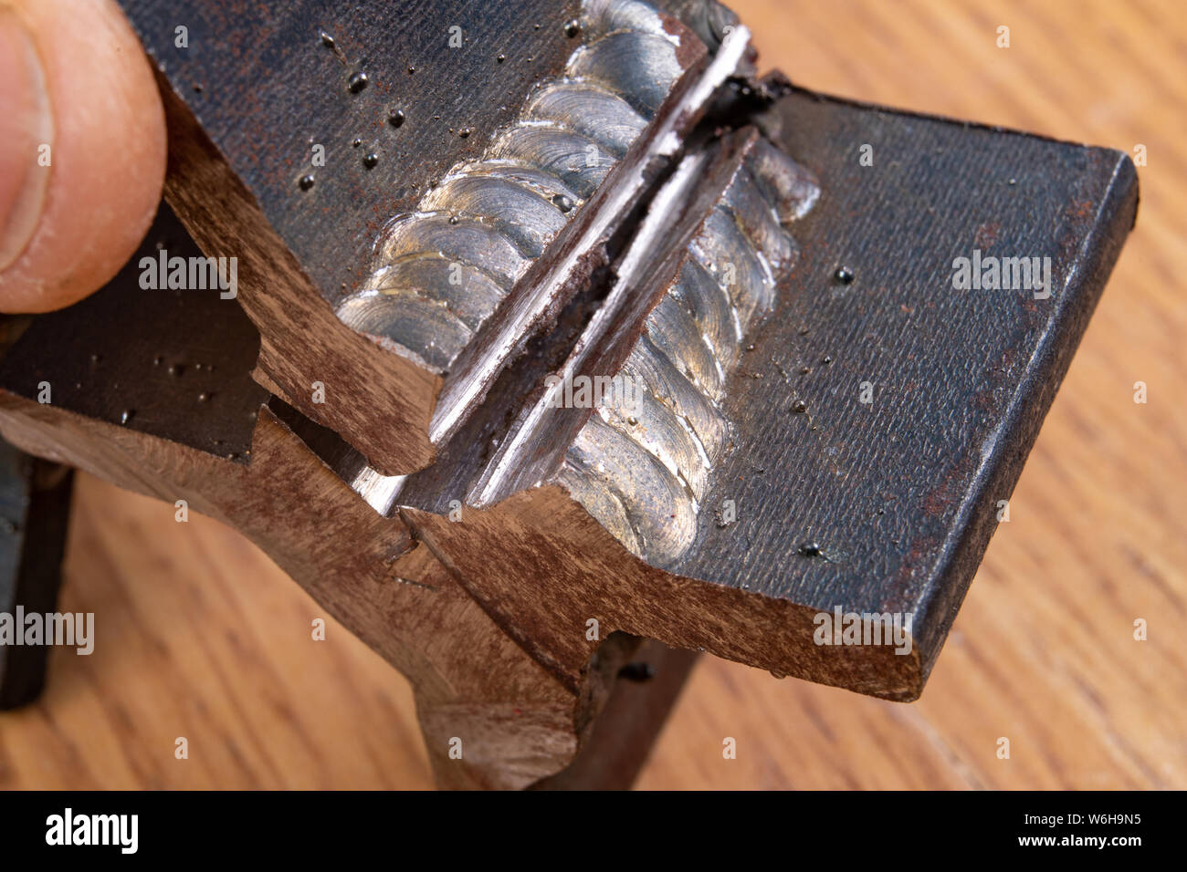 The fillet weld is rubbed with a angle grinder. Destructive method for ...
