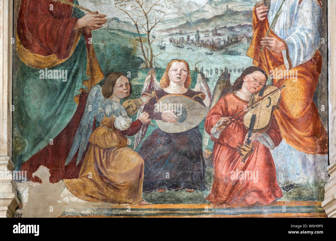 The fresco of angels with the music instruments by Bonino da Campione ...