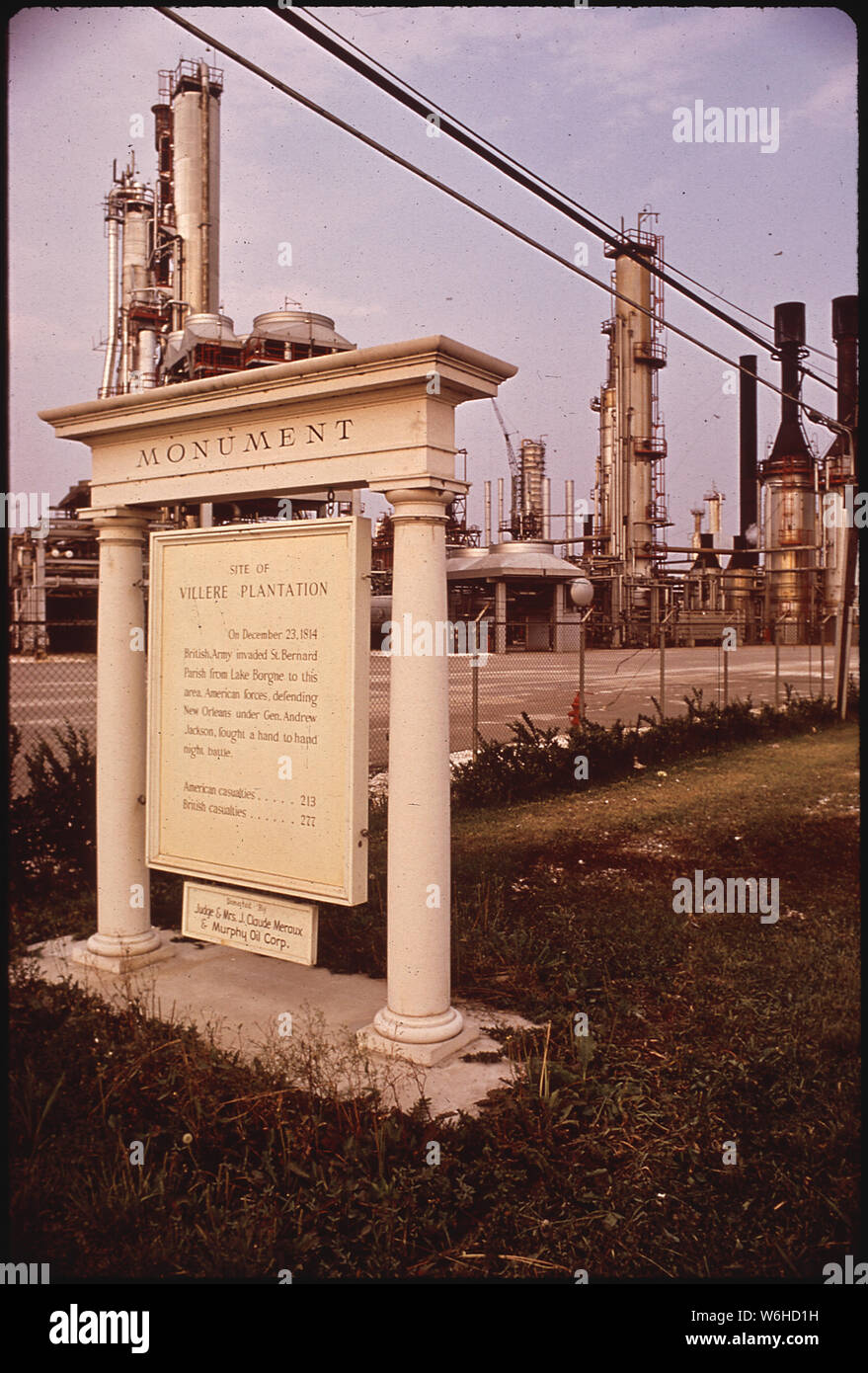 HISTORICAL MARKER NOTING PLANTATION SITE STANDS AT ENTRANCE TO REFINERY ...