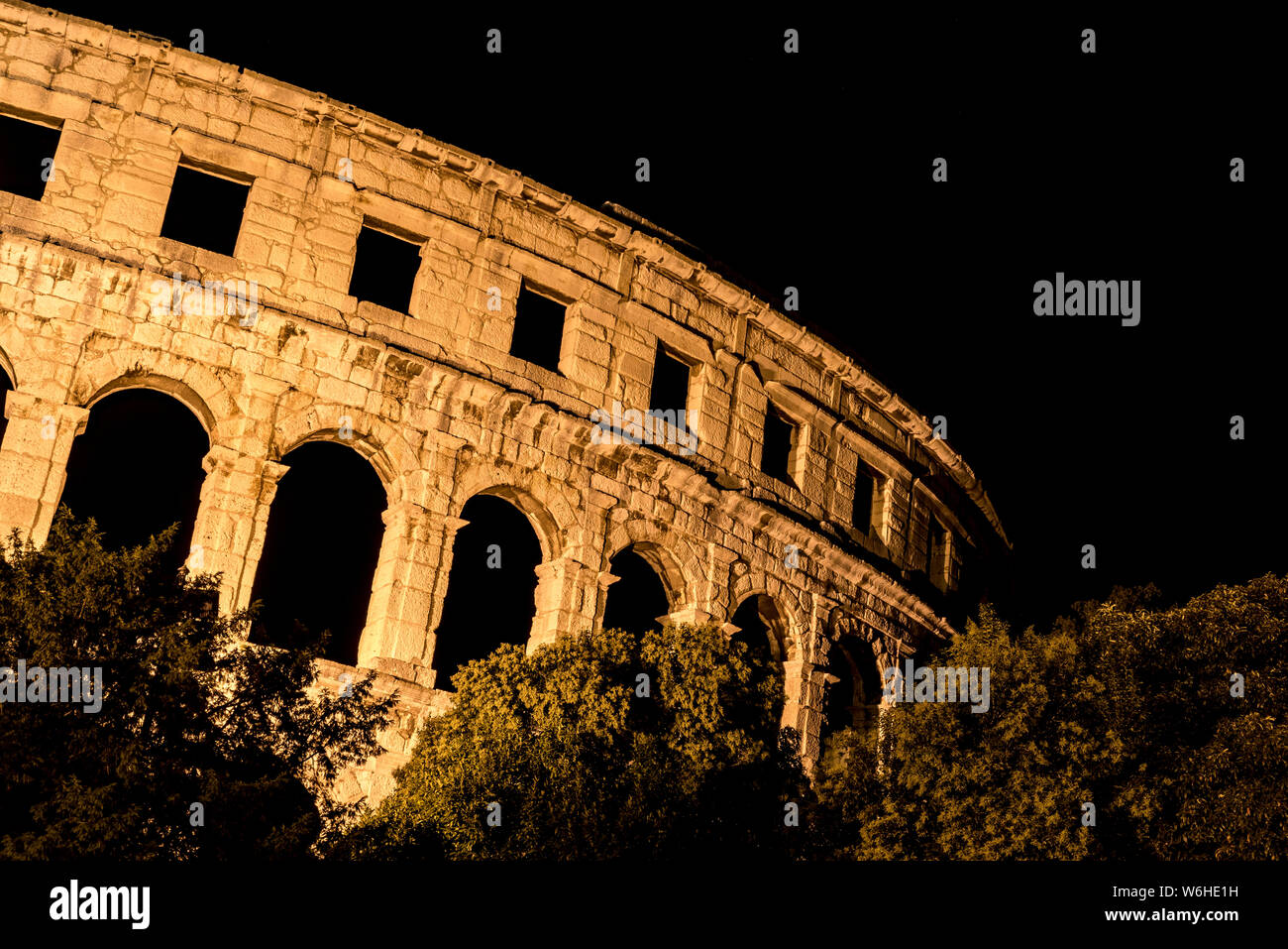 Ancient Roman Amphitheatre, known as Pula Arena, at night; Pula, Istria ...