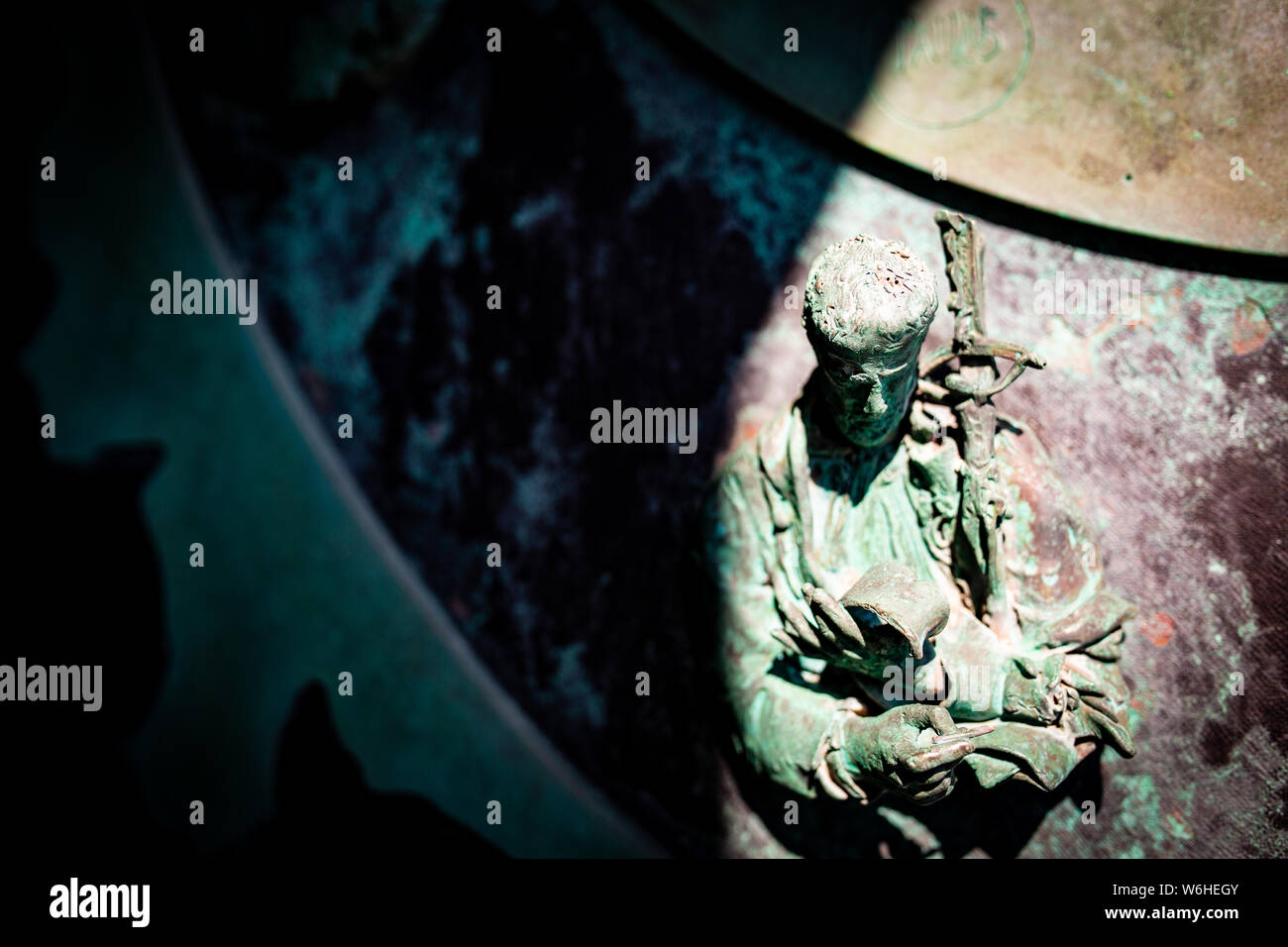 Statue between dark and shadow Stock Photo - Alamy
